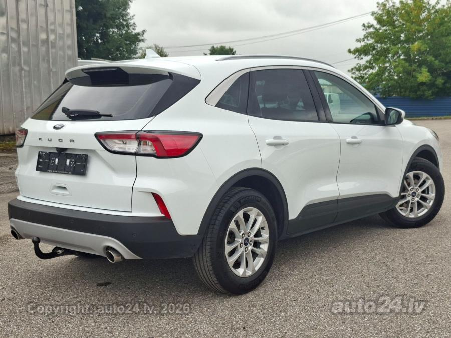 White Ford Kuga 2022 in Tartu, with an engine capacity of 1.50 L and mileage of 170 thousand km for 14999 €, photo 5 on AUTOMOTO.COM.LV