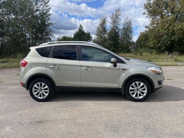 Yellow Ford Kuga 2009 in Ukmerge, with an engine capacity of 2.00 L and mileage of 255 thousand km for 3100 €, photo 5 on AUTOMOTO.COM.LV
