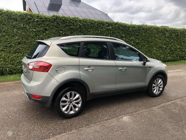 Yellow Ford Kuga 2010 in Panevezys, with an engine capacity of 2.00 L and mileage of 235 thousand km for 5500 €, photo 2 on AUTOMOTO.COM.LV