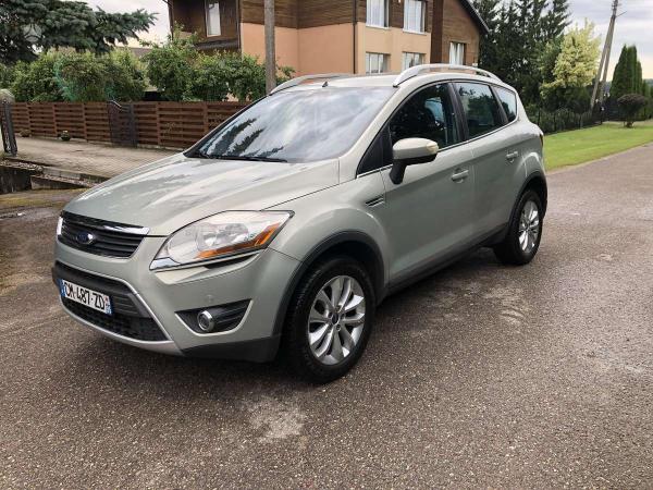 Yellow Ford Kuga 2010 in Panevezys, with an engine capacity of 2.00 L and mileage of 235 thousand km for 5500 €, photo 3 on AUTOMOTO.COM.LV