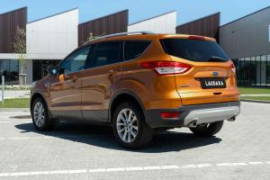 Yellow Ford Kuga 2015 in Vilnius, with an engine capacity of 2.00 L and mileage of 200 thousand km for 6890 €, photo 4 on AUTOMOTO.COM.LV