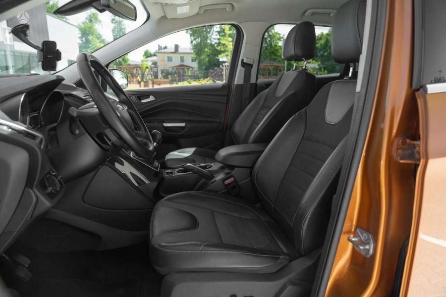 Yellow Ford Kuga 2015 in Vilnius, with an engine capacity of 2.00 L and mileage of 200 thousand km for 6890 €, photo 13 on AUTOMOTO.COM.LV