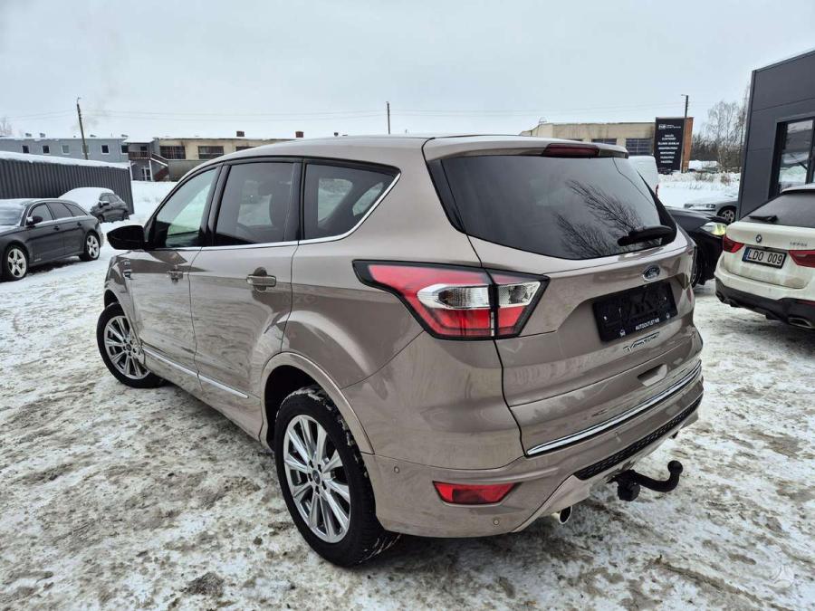 Yellow Ford Kuga 2017 in Utena, with an engine capacity of 2.00 L and mileage of 258 thousand km for 11990 €, photo 4 on AUTOMOTO.COM.LV