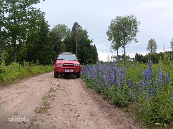 Sarkans Ford Maverick 1995 Tallina, ar dzinēja tilpumu 2.40 L un nobraukumu 231 tūkst. km par 3300 €, foto 2 vietnē AUTOMOTO.COM.LV