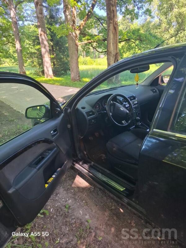 Melns Ford Mondeo 2006 Rīga, ar dzinēja tilpumu 2.00 L un nobraukumu 315 tūkst. km par 550 €, foto 9 vietnē AUTOMOTO.COM.LV