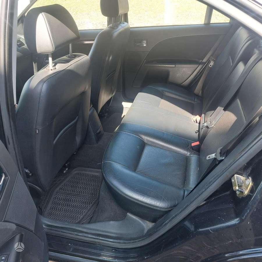Melns Ford Mondeo 2006 Anykščiai, ar dzinēja tilpumu 2.00 L un nobraukumu 206 tūkst. km par 850 €, foto 9 vietnē AUTOMOTO.COM.LV