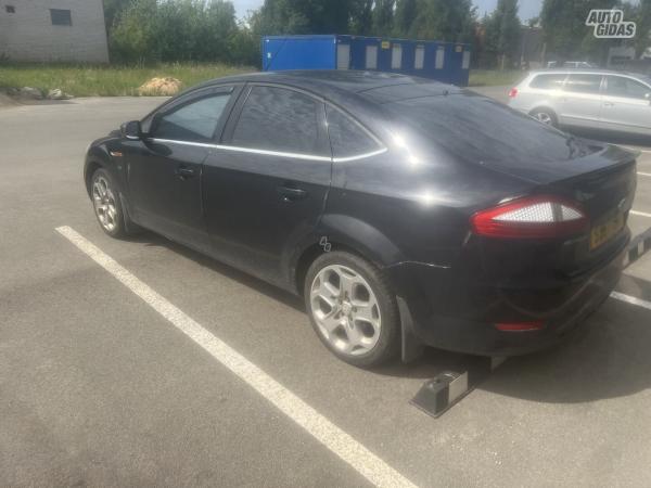 Ford Mondeo 2008 in Panevezys on AUTOMOTO.COM.LV Black Ford Mondeo 2008 in Panevezys, with an engine capacity of 2.00 L and mileage of 230 thousand km for 1200 €, photo 5 on AUTOMOTO.COM.LV