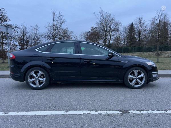 Black Ford Mondeo 2011 in Vilnius, with an engine capacity of 2.20 L and mileage of 228 thousand km for 4800 €, photo 4 on AUTOMOTO.COM.LV