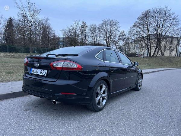 Black Ford Mondeo 2011 in Vilnius, with an engine capacity of 2.20 L and mileage of 228 thousand km for 4800 €, photo 5 on AUTOMOTO.COM.LV