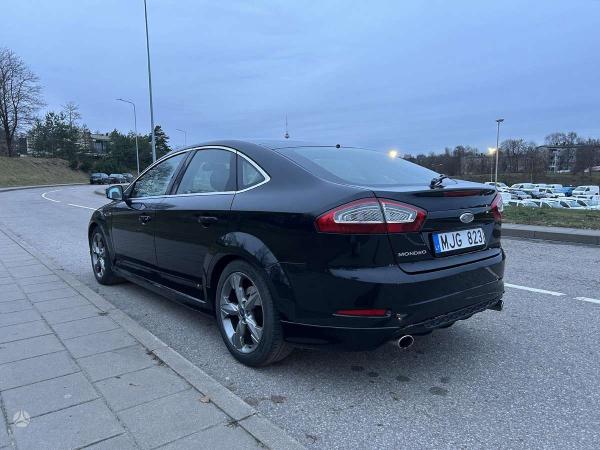 Black Ford Mondeo 2011 in Vilnius, with an engine capacity of 2.20 L and mileage of 228 thousand km for 4800 €, photo 7 on AUTOMOTO.COM.LV