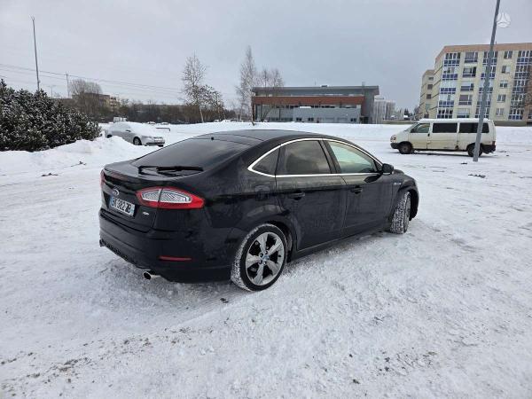 Black Ford Mondeo 2011 in Siauliai, with an engine capacity of 2.20 L and mileage of 350 thousand km for 4499 €, photo 3 on AUTOMOTO.COM.LV