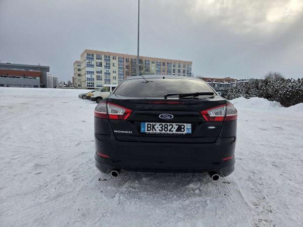 Black Ford Mondeo 2011 in Siauliai, with an engine capacity of 2.20 L and mileage of 350 thousand km for 4499 €, photo 4 on AUTOMOTO.COM.LV