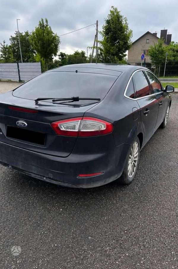 Black Ford Mondeo 2012 in Panevezys, with an engine capacity of 2.00 L and mileage of 253 thousand km for 950 €, photo 1 on AUTOMOTO.COM.LV