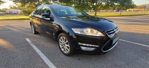 Black Ford Mondeo 2012 in Viljandi, with an engine capacity of 2.00 L and mileage of 194 thousand km for 4999 €, photo 16 on AUTOMOTO.COM.LV