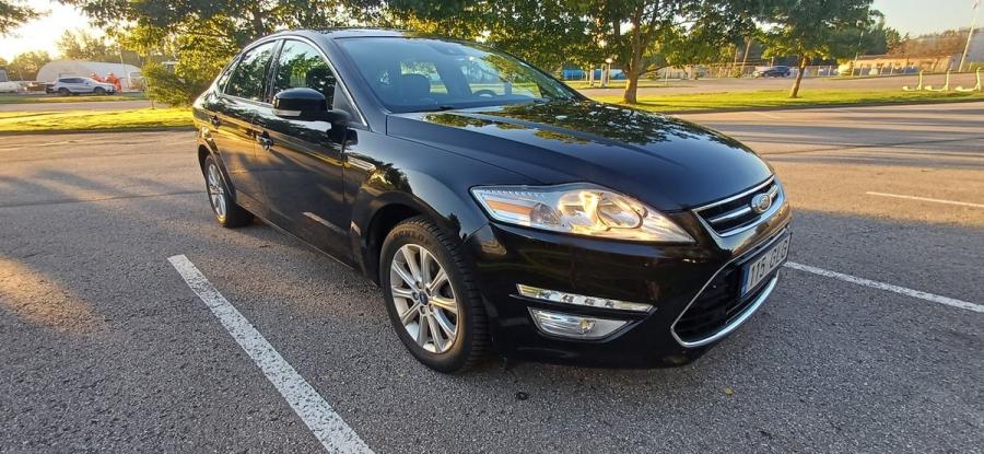 Black Ford Mondeo 2012 in Viljandi, with an engine capacity of 2.00 L and mileage of 194 thousand km for 4999 €, photo 16 on AUTOMOTO.COM.LV