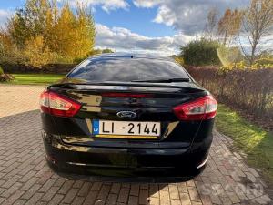 Melns Ford Mondeo 2013 Rīga, ar dzinēja tilpumu 1.60 L un nobraukumu 228 tūkst. km par 4650 €, foto 5 vietnē AUTOMOTO.COM.LV