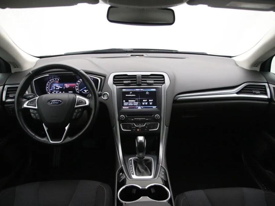 Black Ford Mondeo 2016 in Vilnius, with an engine capacity of 1.50 L and mileage of 133 thousand km for 10399 €, photo 3 on AUTOMOTO.COM.LV
