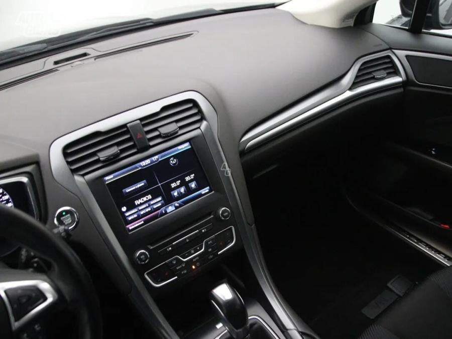 Black Ford Mondeo 2016 in Vilnius, with an engine capacity of 1.50 L and mileage of 133 thousand km for 10399 €, photo 22 on AUTOMOTO.COM.LV