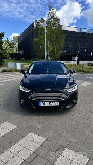 Black Ford Mondeo 2016 in Cesis, with an engine capacity of 2.00 L and mileage of 241 thousand km for 7699 €, photo 4 on AUTOMOTO.COM.LV
