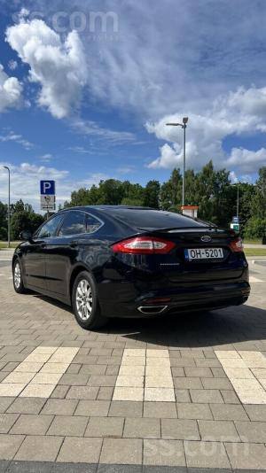 Black Ford Mondeo 2016 in Cesis, with an engine capacity of 2.00 L and mileage of 241 thousand km for 7699 €, photo 5 on AUTOMOTO.COM.LV