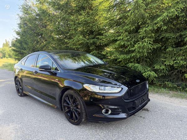 Black Ford Mondeo 2017 in Utena, with an engine capacity of 2.00 L and mileage of 25 thousand km for 8850 €, photo 4 on AUTOMOTO.COM.LV