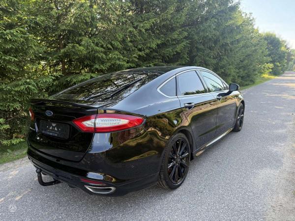 Black Ford Mondeo 2017 in Utena, with an engine capacity of 2.00 L and mileage of 25 thousand km for 8850 €, photo 5 on AUTOMOTO.COM.LV
