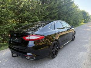 Black Ford Mondeo 2017 in Utena, with an engine capacity of 2.00 L and mileage of 25 thousand km for 8850 €, photo 6 on AUTOMOTO.COM.LV