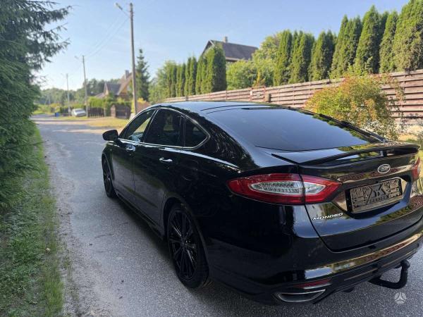 Black Ford Mondeo 2017 in Utena, with an engine capacity of 2.00 L and mileage of 25 thousand km for 8850 €, photo 7 on AUTOMOTO.COM.LV