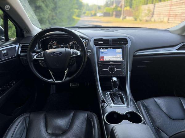 Black Ford Mondeo 2017 in Utena, with an engine capacity of 2.00 L and mileage of 25 thousand km for 8850 €, photo 10 on AUTOMOTO.COM.LV