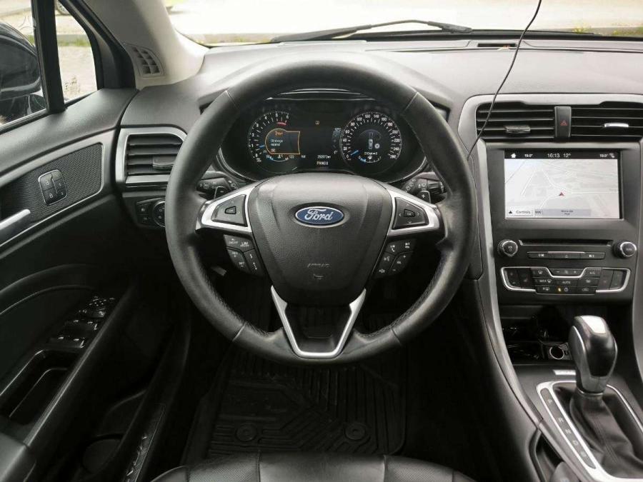 Black Ford Mondeo 2017 in Riga, with an engine capacity of 2.00 L and mileage of 253 thousand km for 7700 €, photo 9 on AUTOMOTO.COM.LV