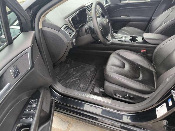 Black Ford Mondeo 2017 in Riga, with an engine capacity of 2.00 L and mileage of 253 thousand km for 7700 €, photo 9 on AUTOMOTO.COM.LV