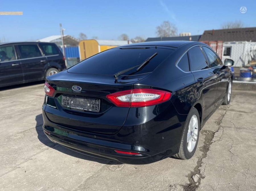 Black Ford Mondeo 2017 in Vilnius, with an engine capacity of 2.00 L and mileage of 253 thousand km for 7750 €, photo 5 on AUTOMOTO.COM.LV