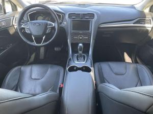 Black Ford Mondeo 2017 in Vilnius, with an engine capacity of 2.00 L and mileage of 253 thousand km for 7750 €, photo 7 on AUTOMOTO.COM.LV