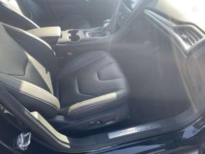 Black Ford Mondeo 2017 in Vilnius, with an engine capacity of 2.00 L and mileage of 253 thousand km for 7750 €, photo 11 on AUTOMOTO.COM.LV