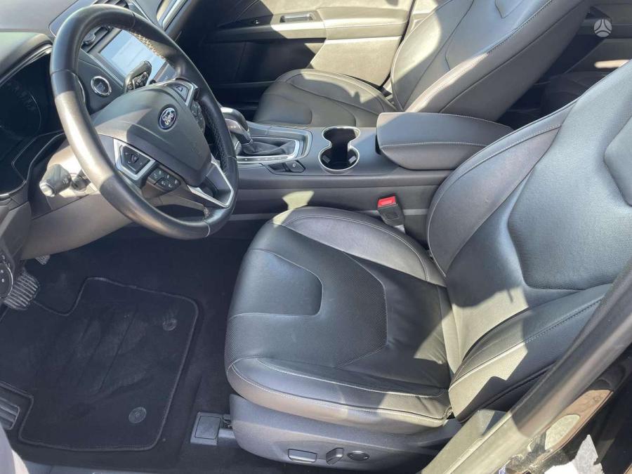 Black Ford Mondeo 2017 in Vilnius, with an engine capacity of 2.00 L and mileage of 253 thousand km for 7750 €, photo 12 on AUTOMOTO.COM.LV