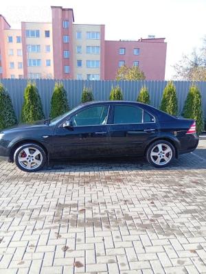 Melns Ford Mondeo 2004 Ludza, ar dzinēja tilpumu 2.00 L un nobraukumu 412 tūkst. km par 1000 €, foto 4 vietnē AUTOMOTO.COM.LV