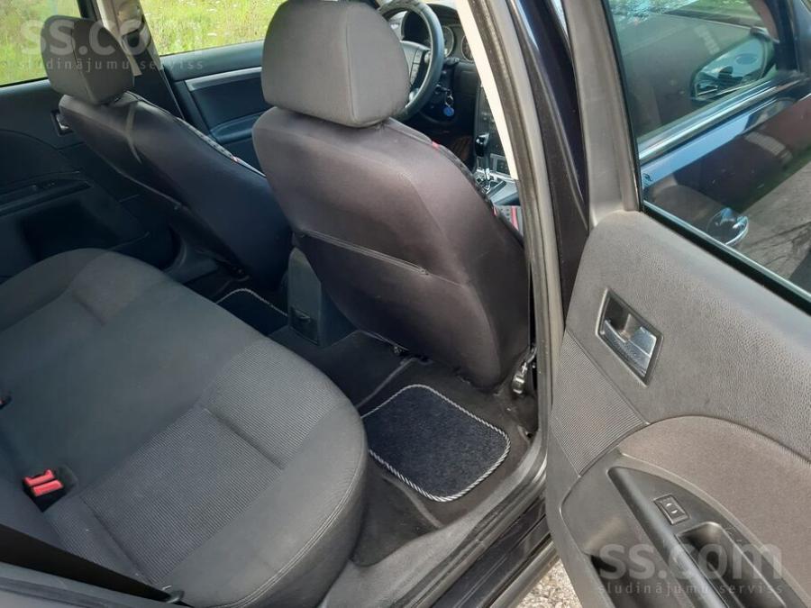 Melns Ford Mondeo 2006 Daugavpils, ar dzinēja tilpumu 2.00 L un nobraukumu 231 tūkst. km par 1700 €, foto 3 vietnē AUTOMOTO.COM.LV