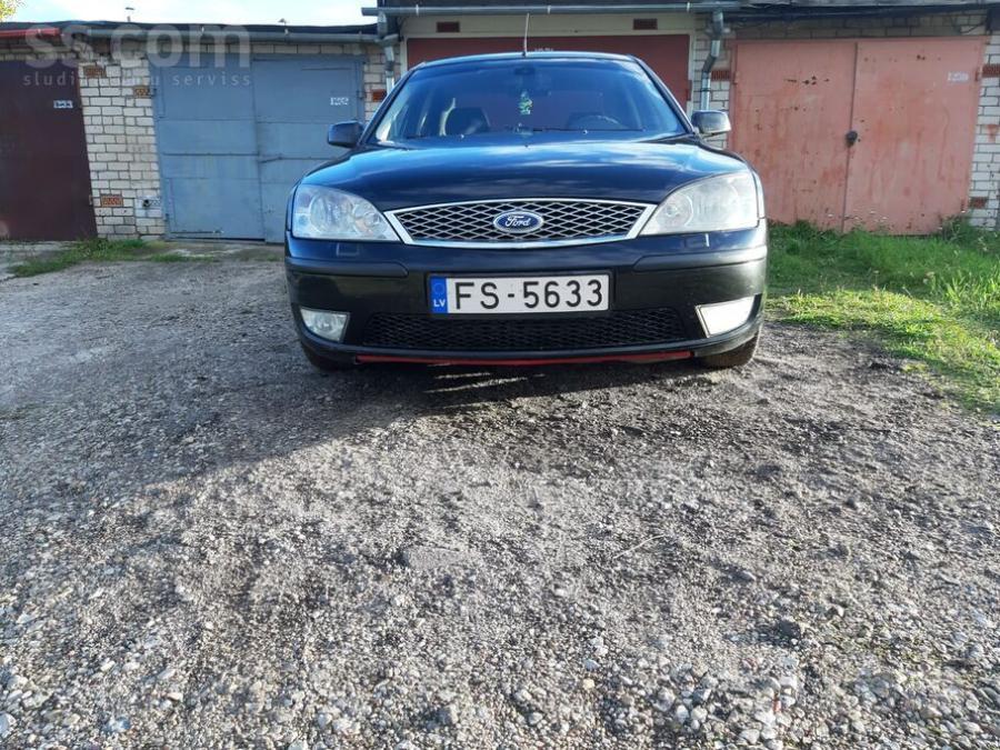 Melns Ford Mondeo 2006 Daugavpils, ar dzinēja tilpumu 2.00 L un nobraukumu 231 tūkst. km par 1700 €, foto 7 vietnē AUTOMOTO.COM.LV