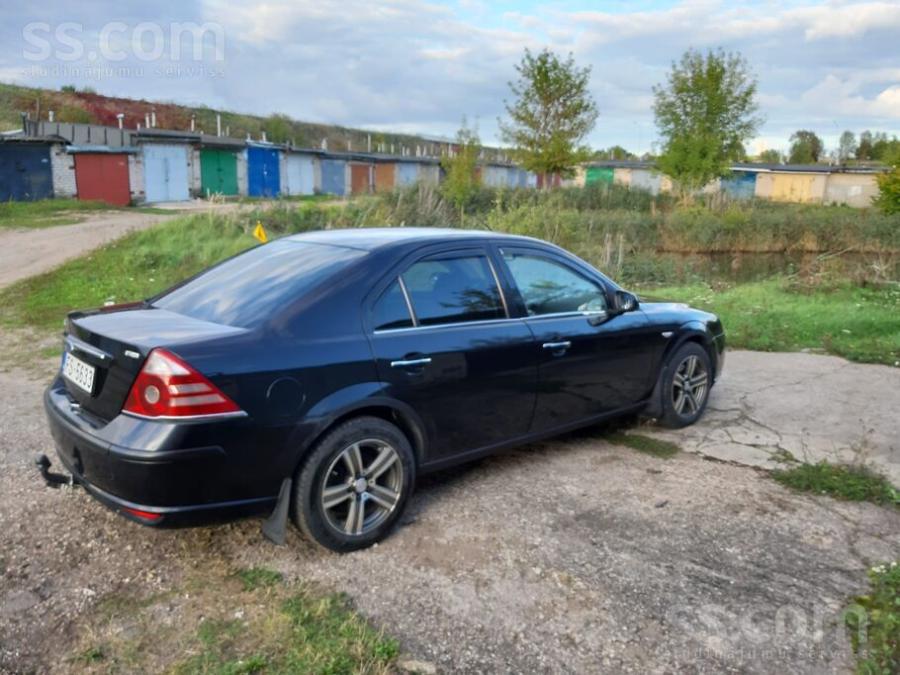 Melns Ford Mondeo 2006 Daugavpils, ar dzinēja tilpumu 2.00 L un nobraukumu 231 tūkst. km par 1700 €, foto 8 vietnē AUTOMOTO.COM.LV