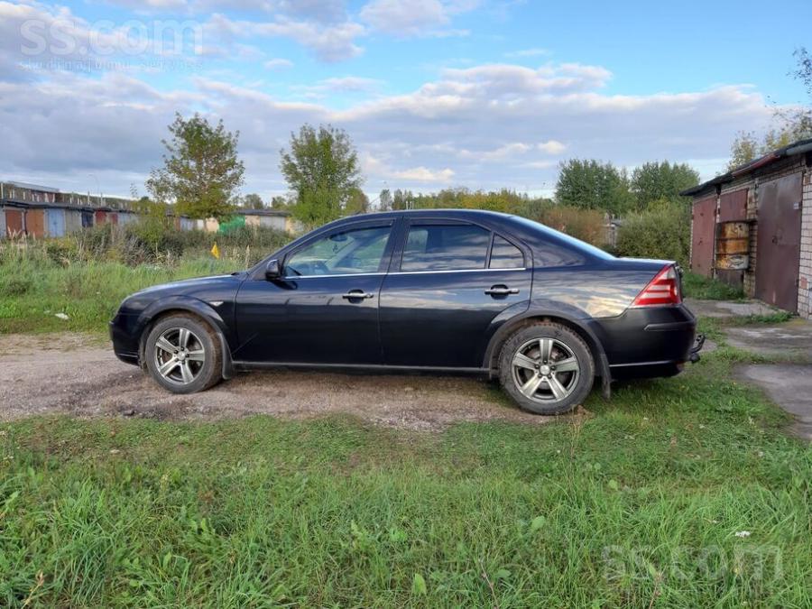 Melns Ford Mondeo 2006 Daugavpils, ar dzinēja tilpumu 2.00 L un nobraukumu 231 tūkst. km par 1700 €, foto 9 vietnē AUTOMOTO.COM.LV