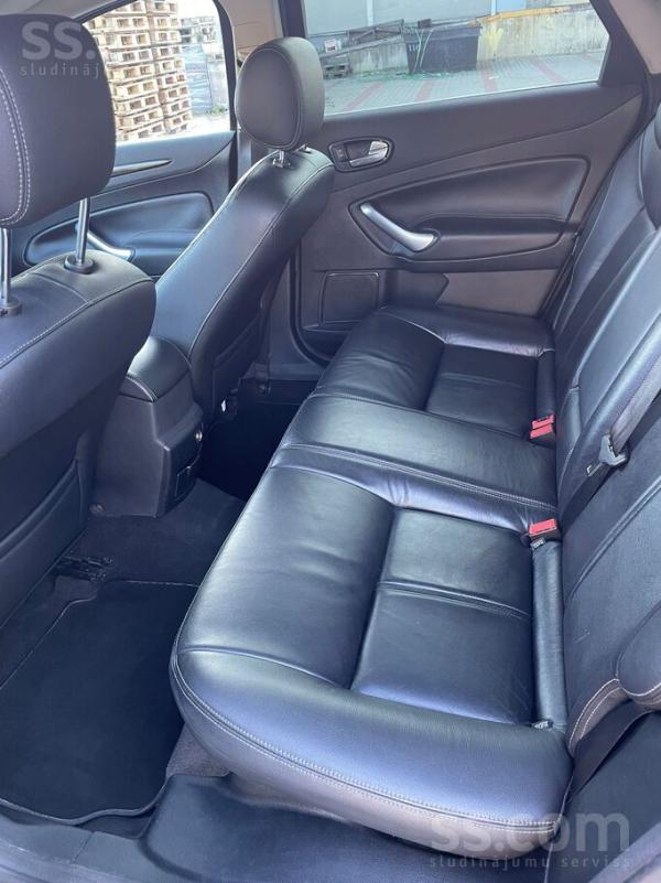 Black Ford Mondeo 2008 in Riga, with an engine capacity of 1.80 L and mileage of 413 thousand km for 1100 €, photo 9 on AUTOMOTO.COM.LV