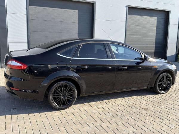 Black Ford Mondeo 2009 in Vilnius, with an engine capacity of 2.00 L and mileage of 339 thousand km for 1950 €, photo 4 on AUTOMOTO.COM.LV