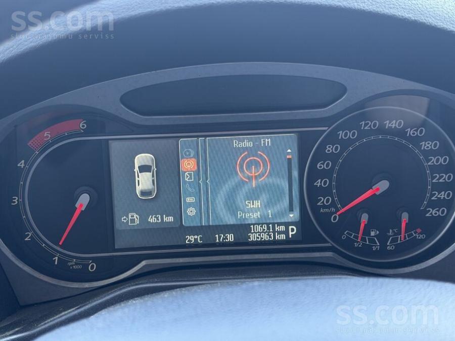 Black Ford Mondeo 2009 in Riga, with an engine capacity of 2.00 L and mileage of 299 thousand km for 1990 €, photo 15 on AUTOMOTO.COM.LV