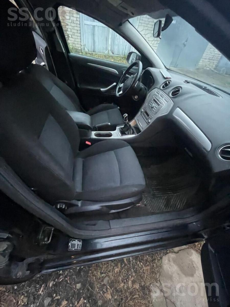 Melns Ford Mondeo 2009 Rīga, ar dzinēja tilpumu 2.00 L un nobraukumu 198 tūkst. km par 1100 €, foto 6 vietnē AUTOMOTO.COM.LV