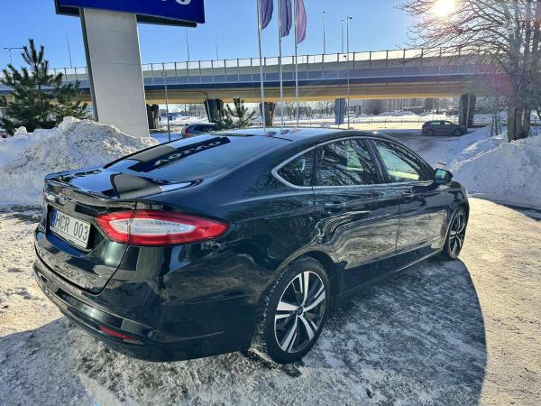 Black Ford Mondeo 2015 in Klaipeda, with an engine capacity of 2.00 L and mileage of 179 thousand km for 7800 €, photo 3 on AUTOMOTO.COM.LV