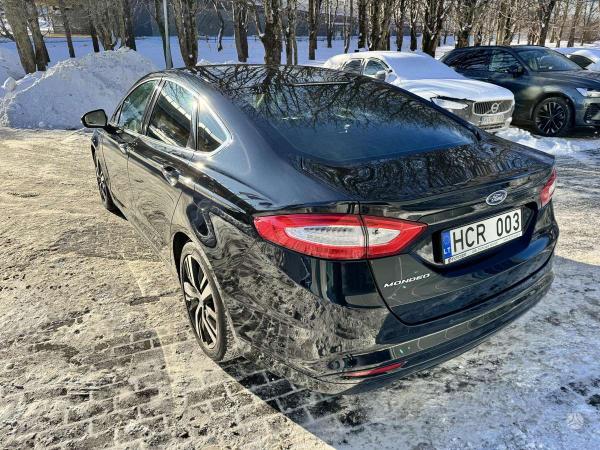 Black Ford Mondeo 2015 in Klaipeda, with an engine capacity of 2.00 L and mileage of 179 thousand km for 7800 €, photo 4 on AUTOMOTO.COM.LV