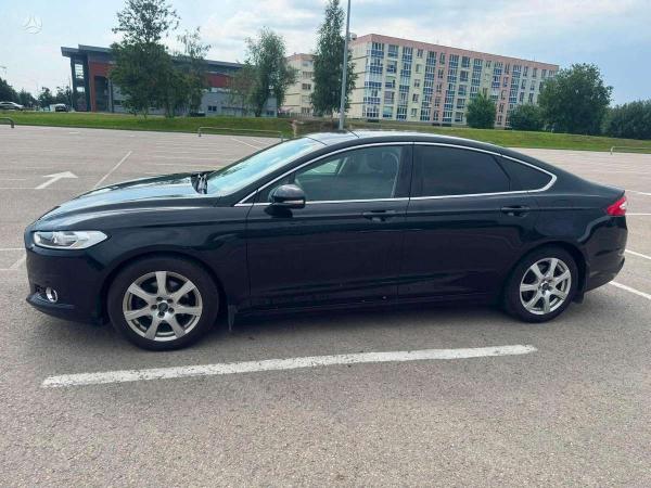 Black Ford Mondeo 2015 in Siauliai, with an engine capacity of 2.00 L and mileage of 325 thousand km for 6999 €, photo 1 on AUTOMOTO.COM.LV