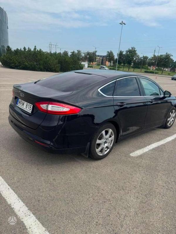 Black Ford Mondeo 2015 in Siauliai, with an engine capacity of 2.00 L and mileage of 325 thousand km for 6999 €, photo 3 on AUTOMOTO.COM.LV