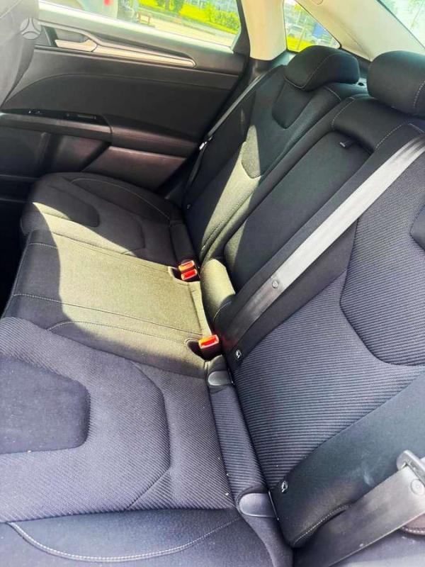 Black Ford Mondeo 2015 in Siauliai, with an engine capacity of 2.00 L and mileage of 325 thousand km for 6999 €, photo 5 on AUTOMOTO.COM.LV
