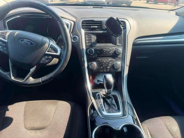 Black Ford Mondeo 2015 in Siauliai, with an engine capacity of 2.00 L and mileage of 325 thousand km for 6999 €, photo 6 on AUTOMOTO.COM.LV